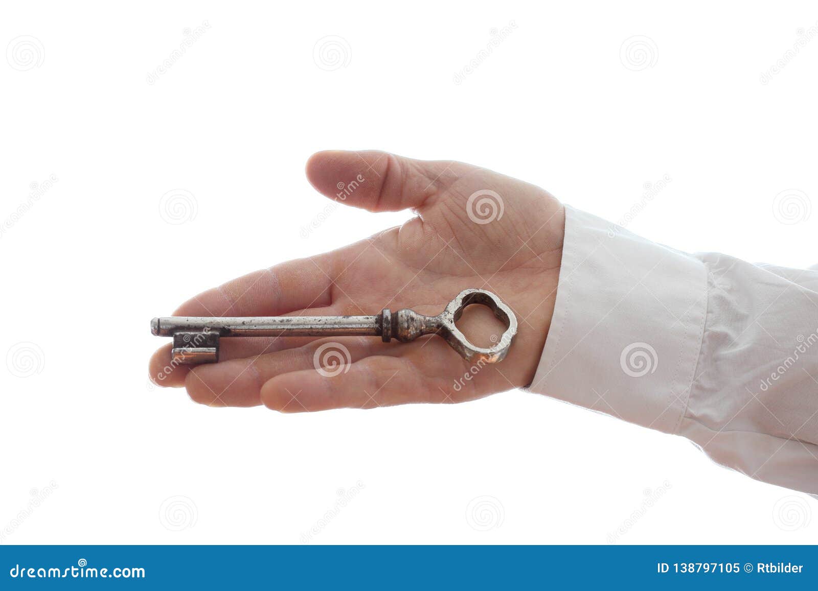 Man is holding an old key stock image. Image of rental - 138797105