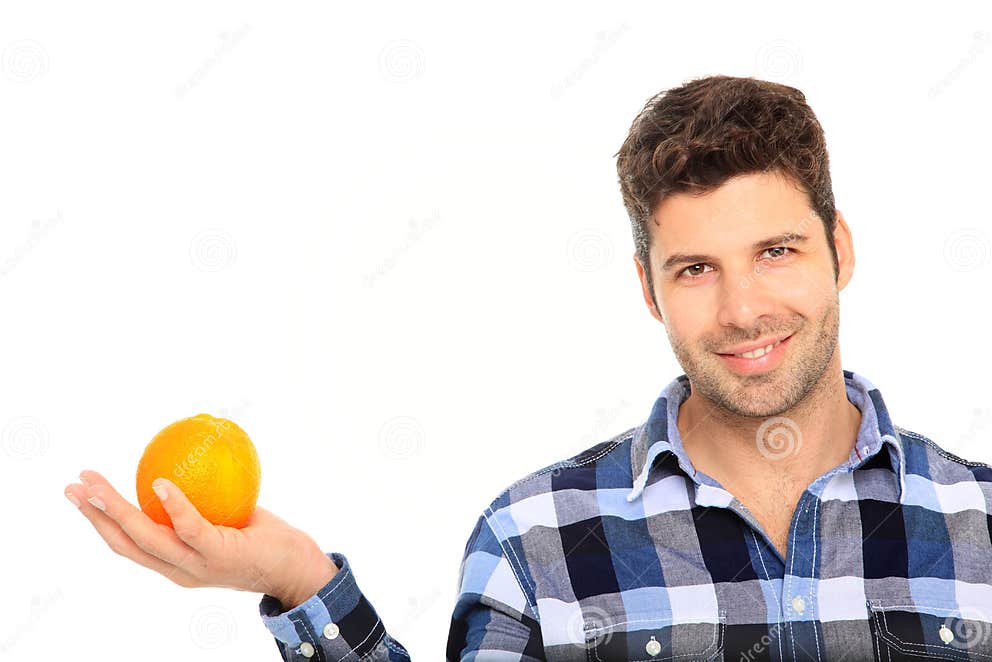 Man holding an orange stock image. Image of indoor, healthy - 22198051