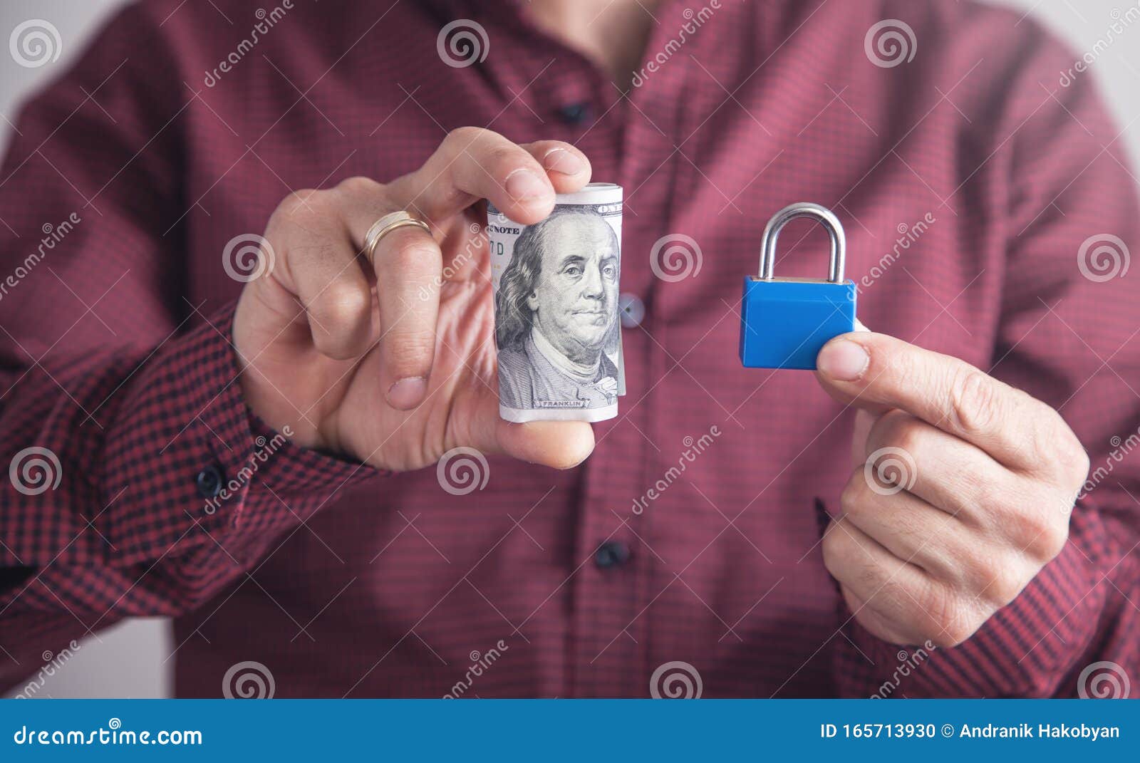 Man Holding Padlock with Dollars. Financial Security Stock Photo ...