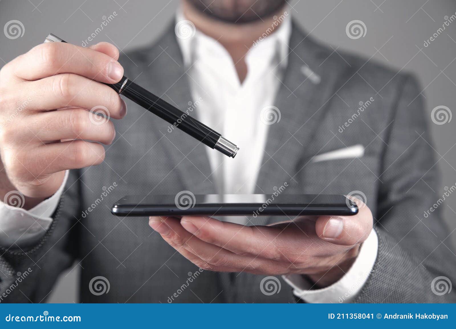 Man Holding Pen and Smartphone. Technology Concept Stock Image - Image ...