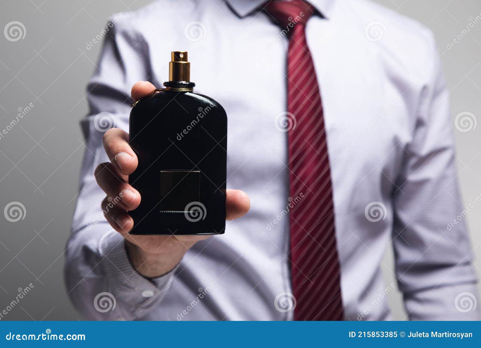Man Holding Perfume in His Hand Stock Image - Image of perfume, hygiene ...