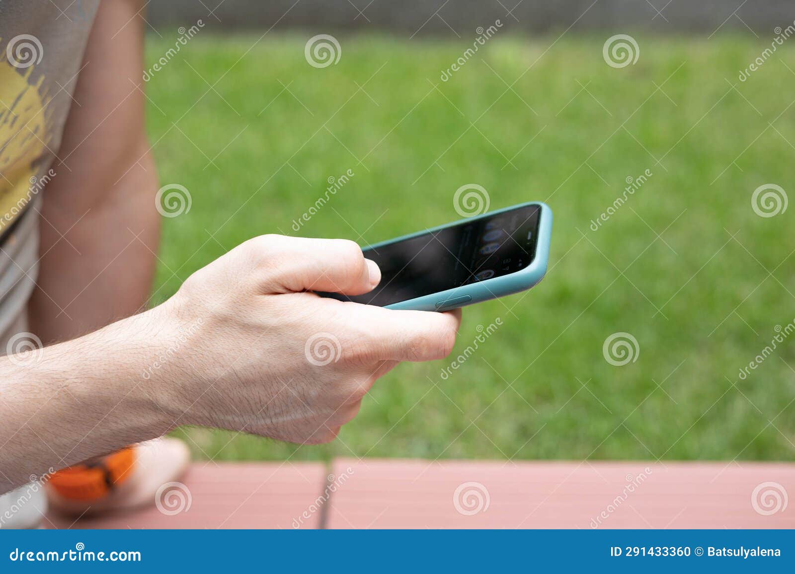 A Man is Holding Phone in His Hand Stock Photo - Image of holding ...