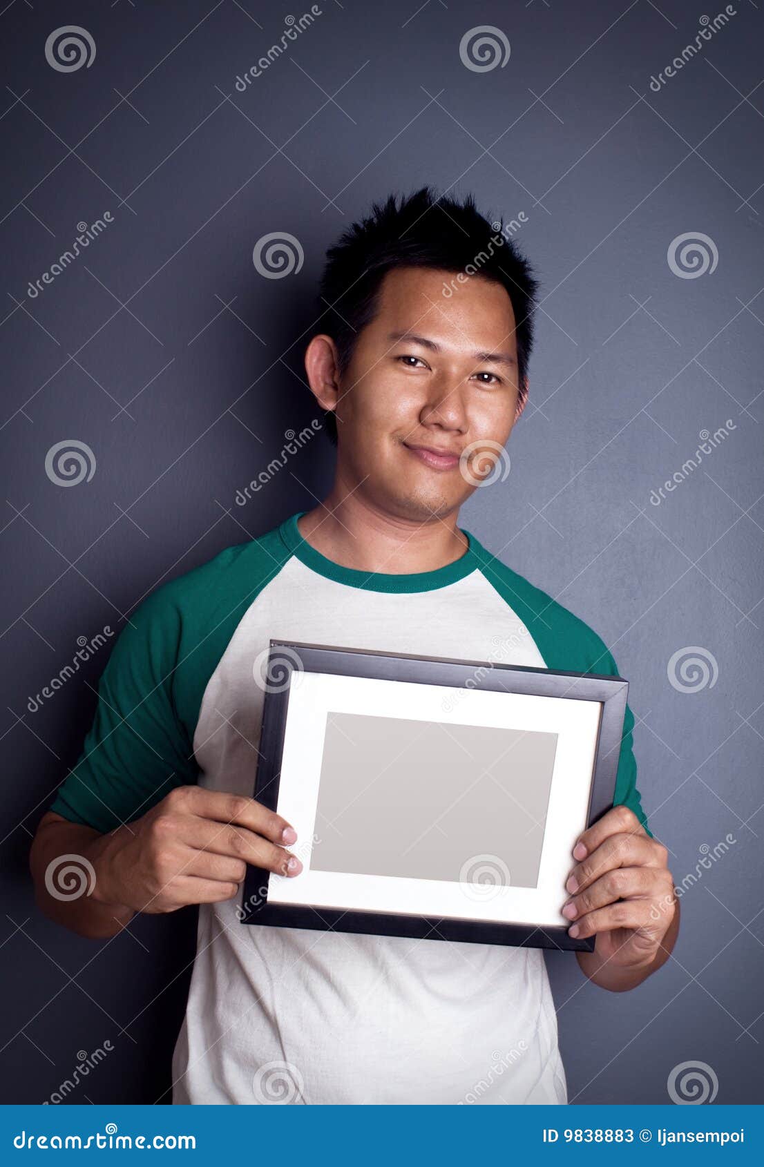 Man holding picture frame stock image. Image of hand, frame - 9838883