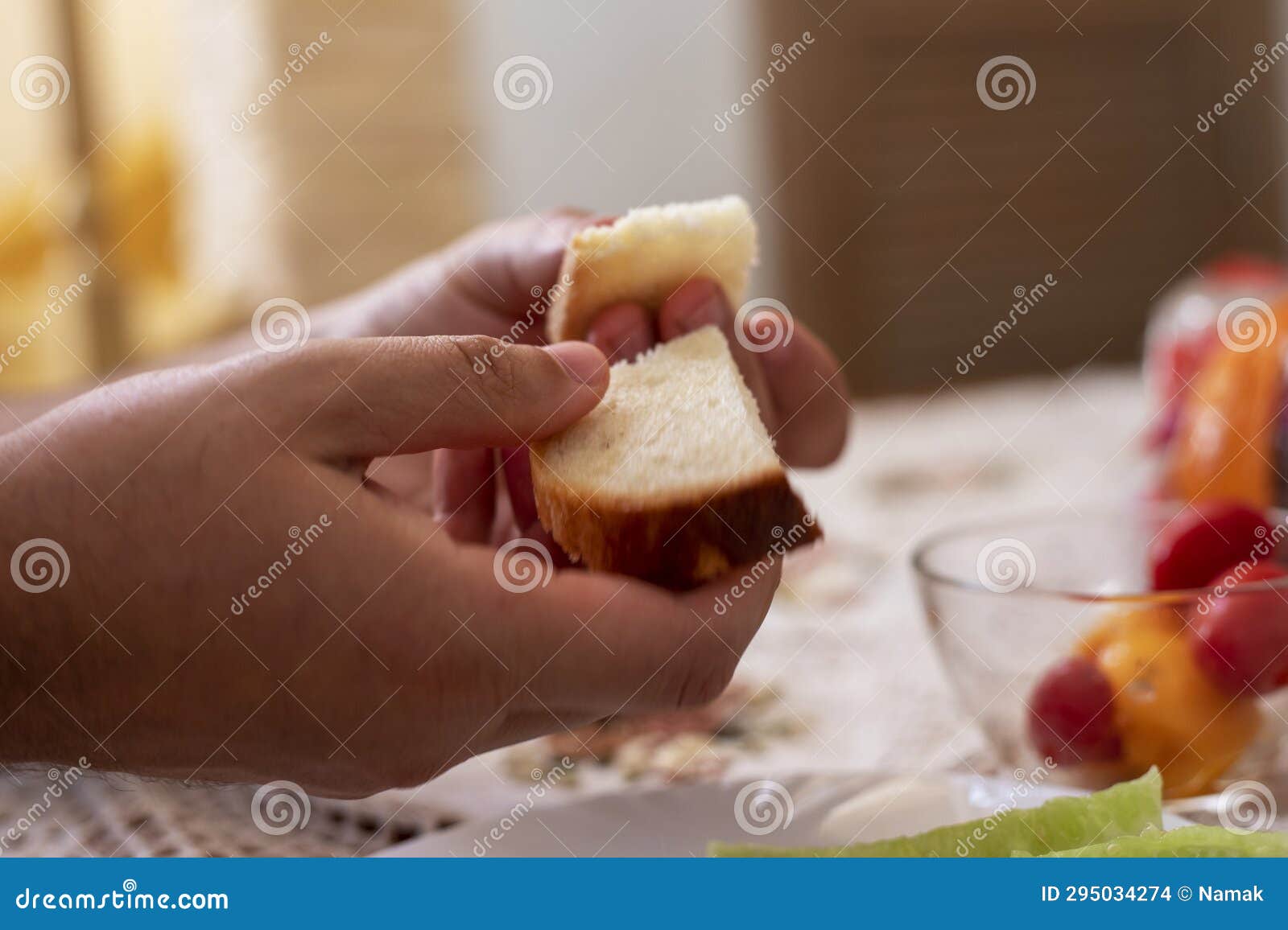 Man Holding Pieces of Sliced Bread in His Hands Stock Photo - Image of ...