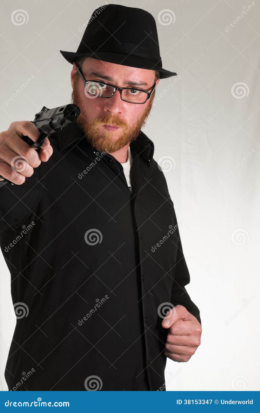 Man Holding a Pistol Gun stock image. Image of gunman - 38153347