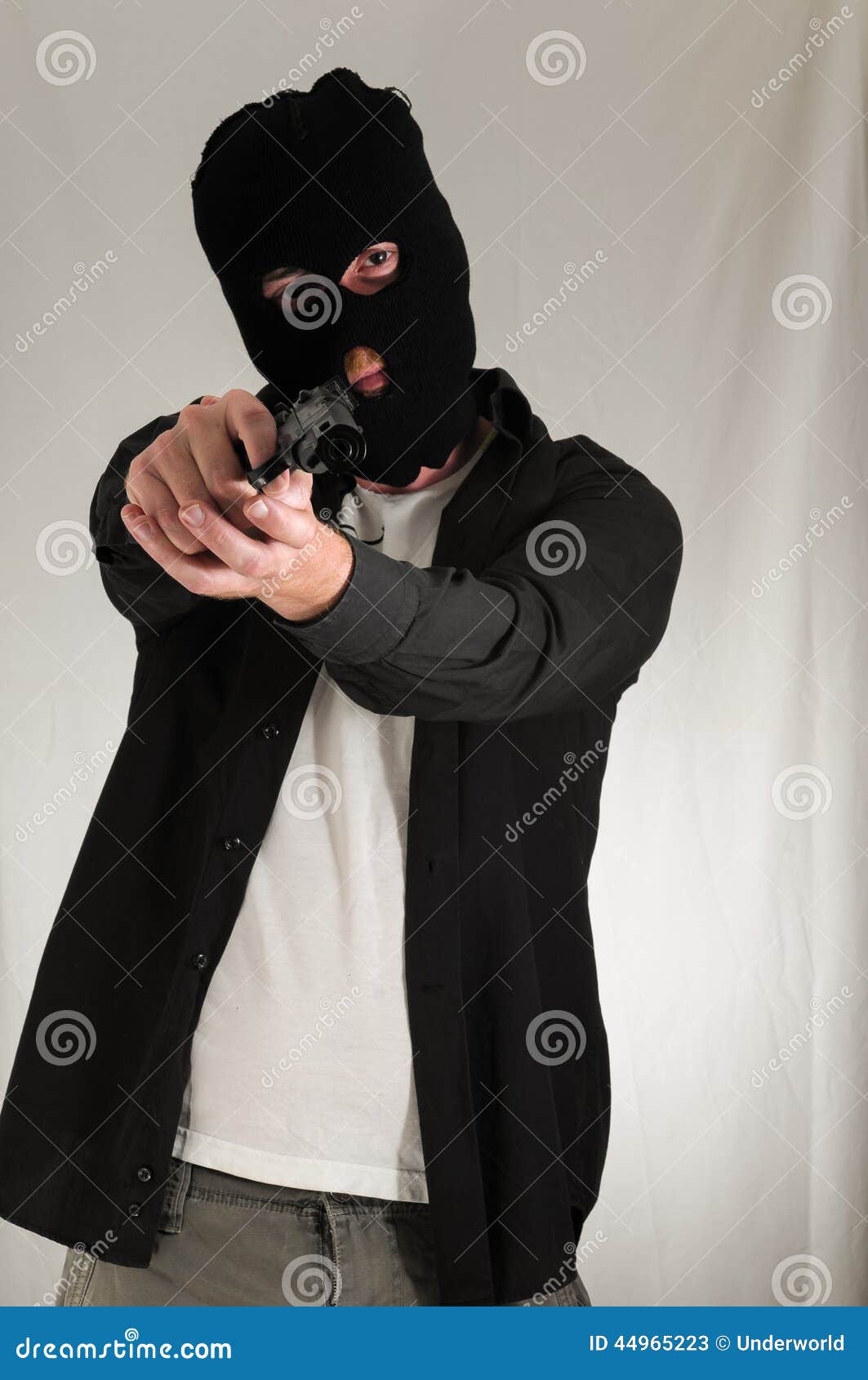 Man Holding a Pistol Gun stock image. Image of weapon - 44965223