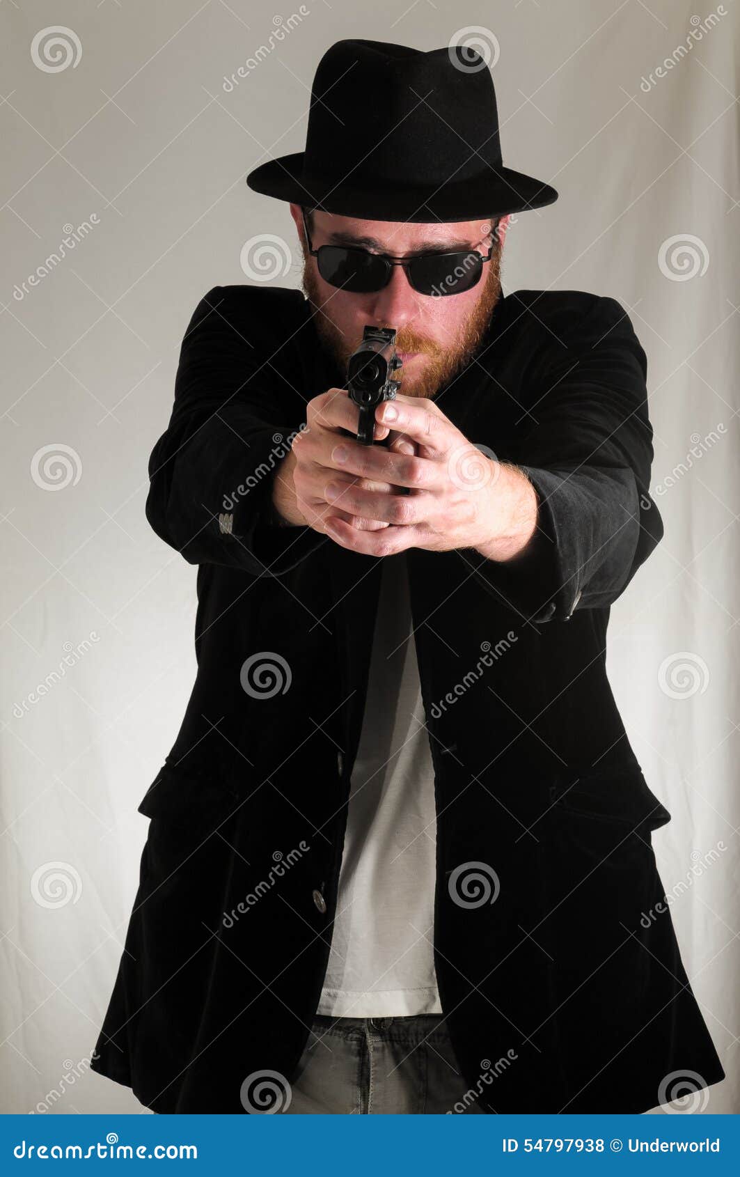 Man Holding a Pistol Gun stock photo. Image of crime - 54797938