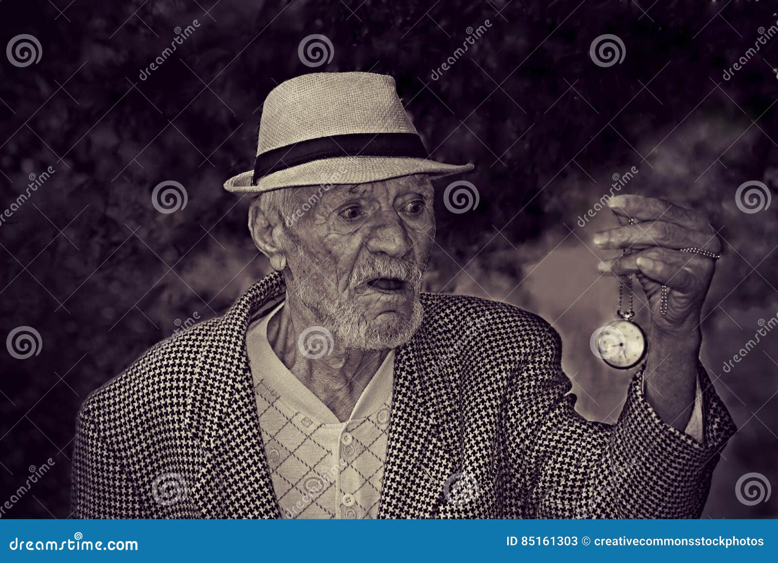 Man Holding Pocket Watch In Grayscale Picture. Image: 85161303