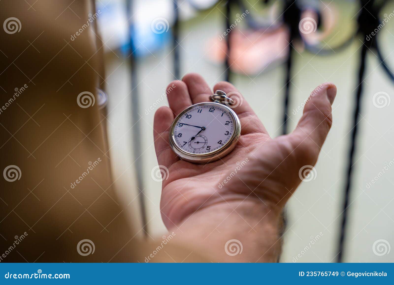 Man Holding a Pocket Watch in His Right Hand Stock Image - Image of ...