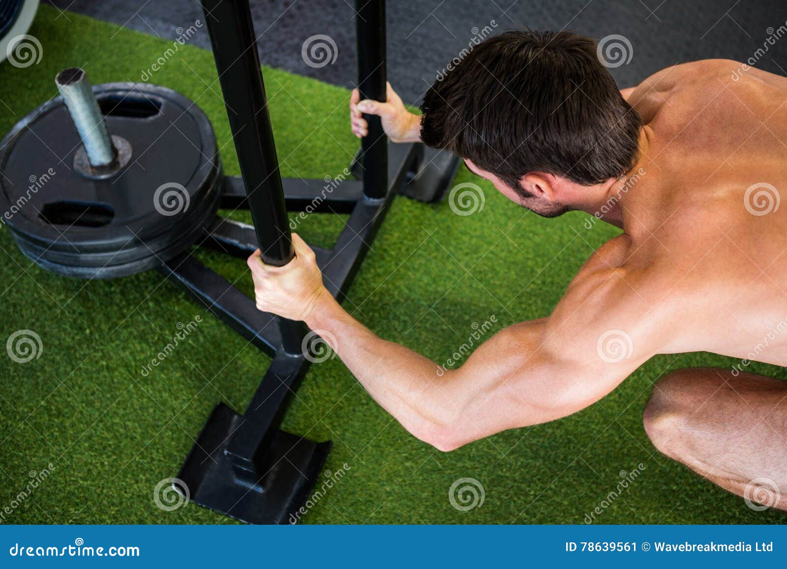 Man Holding Poles while Exercising in Gym Stock Image - Image of ...