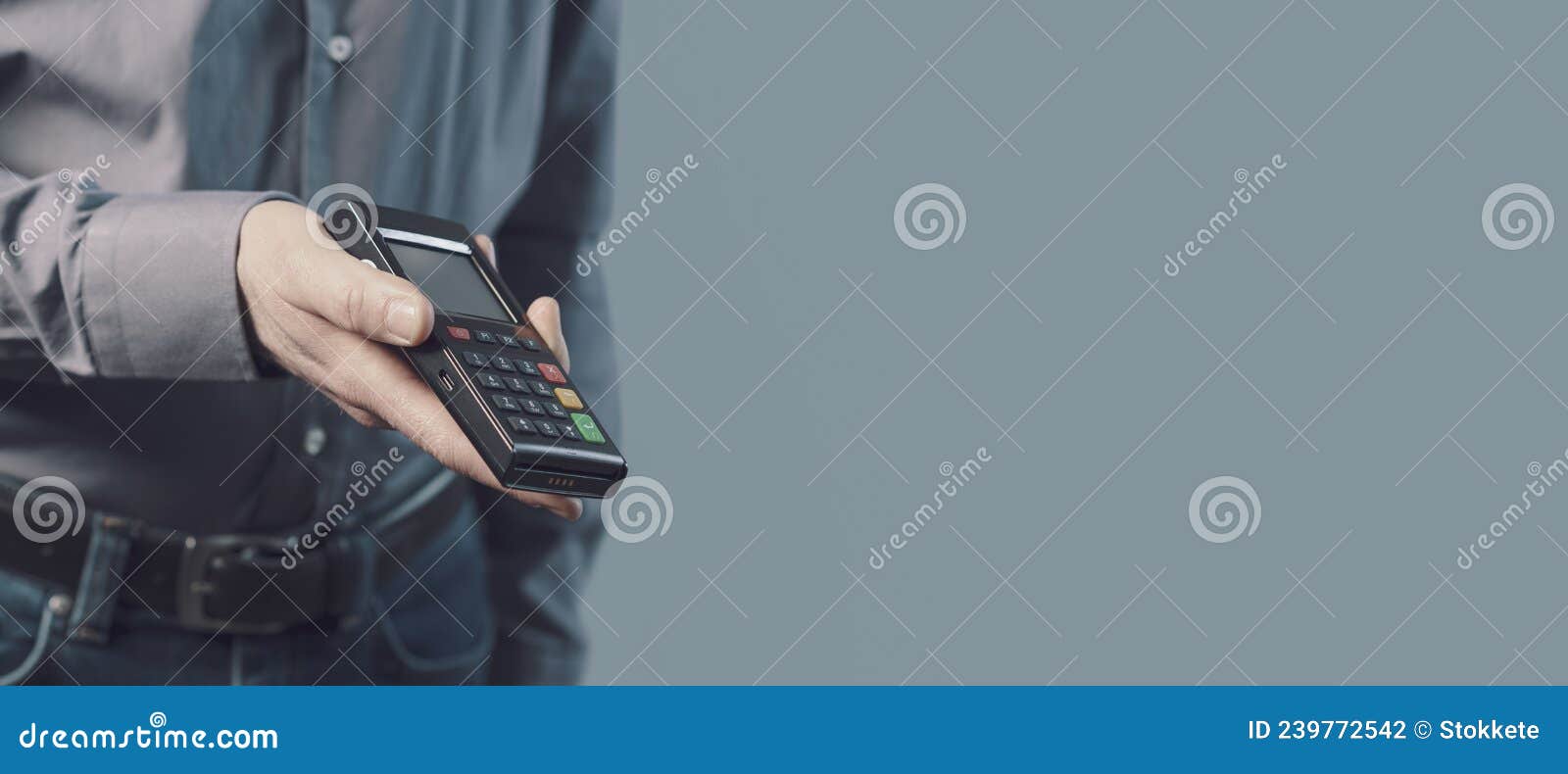 Man holding a POS terminal stock photo. Image of manager - 239772542