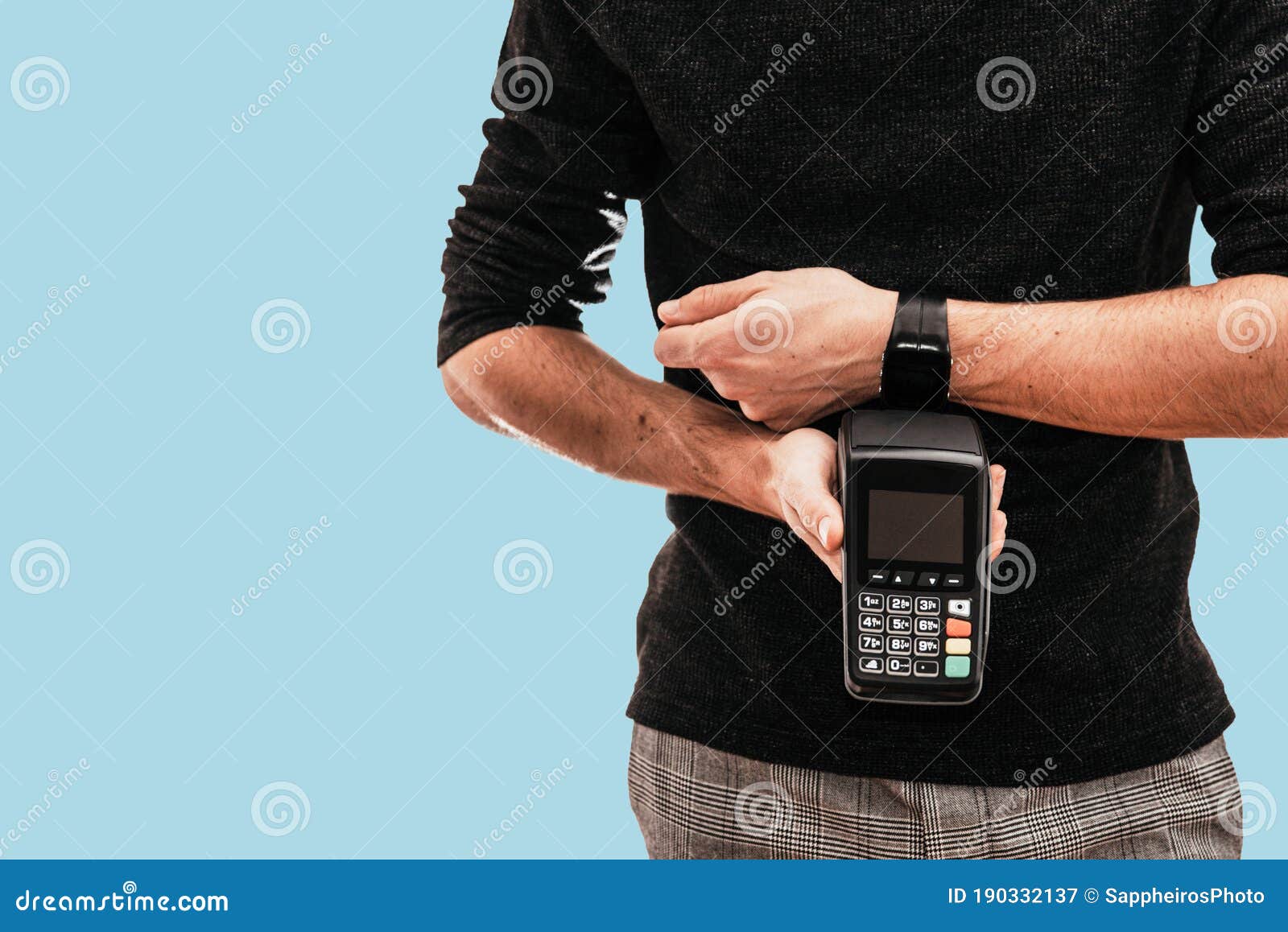Man Holding Pos Terminal and Using Smartwatch To Pay. Concept of NFC ...