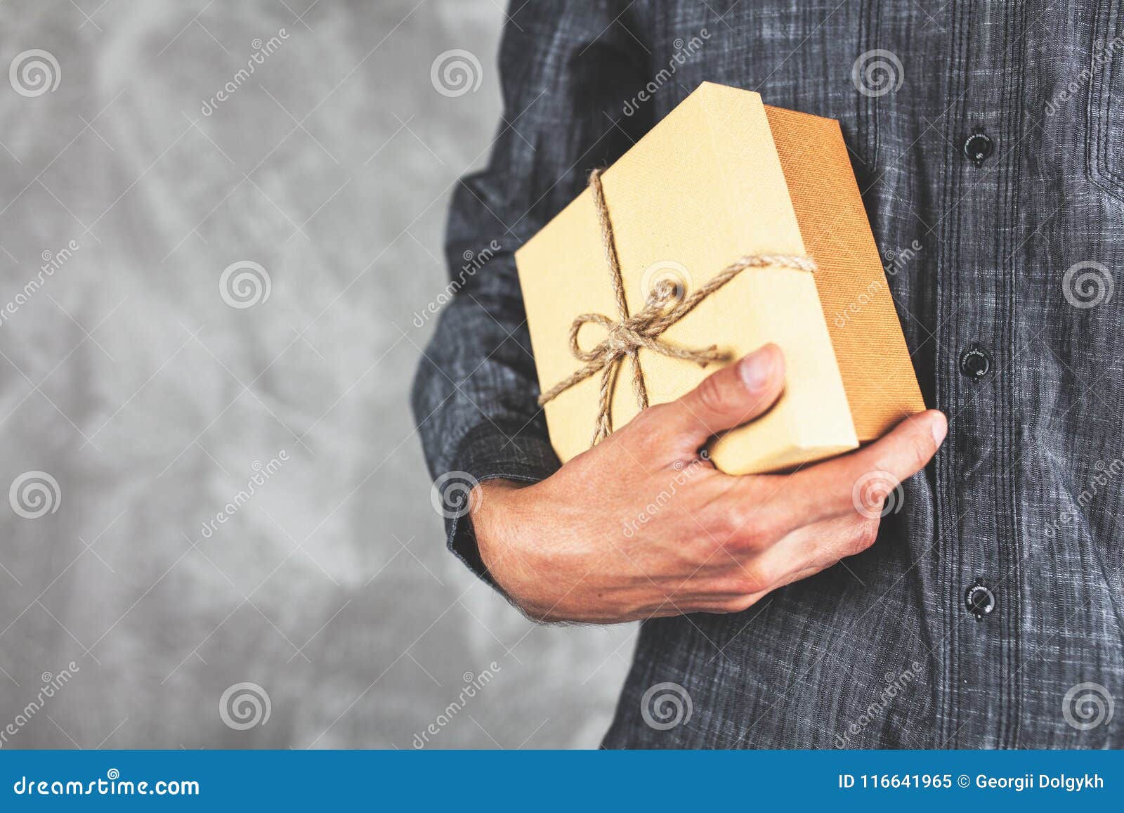 Man holding a present box stock image. Image of birthday - 116641965