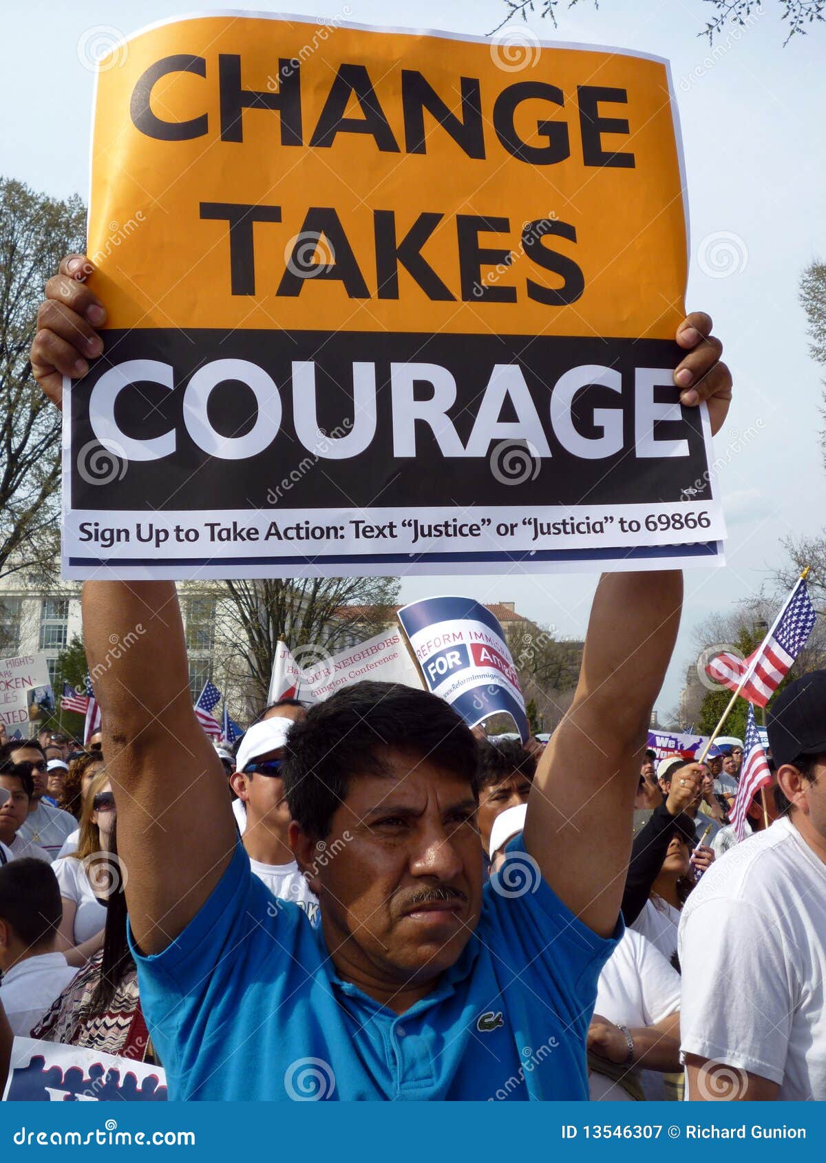 Man Holding Protest Sign editorial photography. Image of people - 13546307