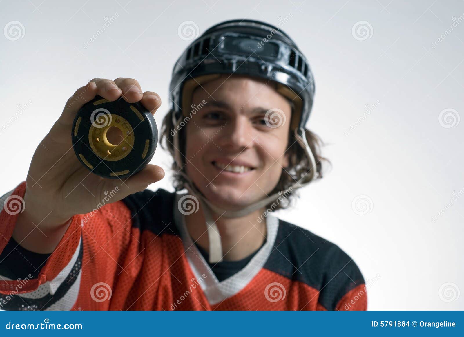 Man Holding Puck - Horizontal Stock Photo - Image of smiling, hold: 5791884