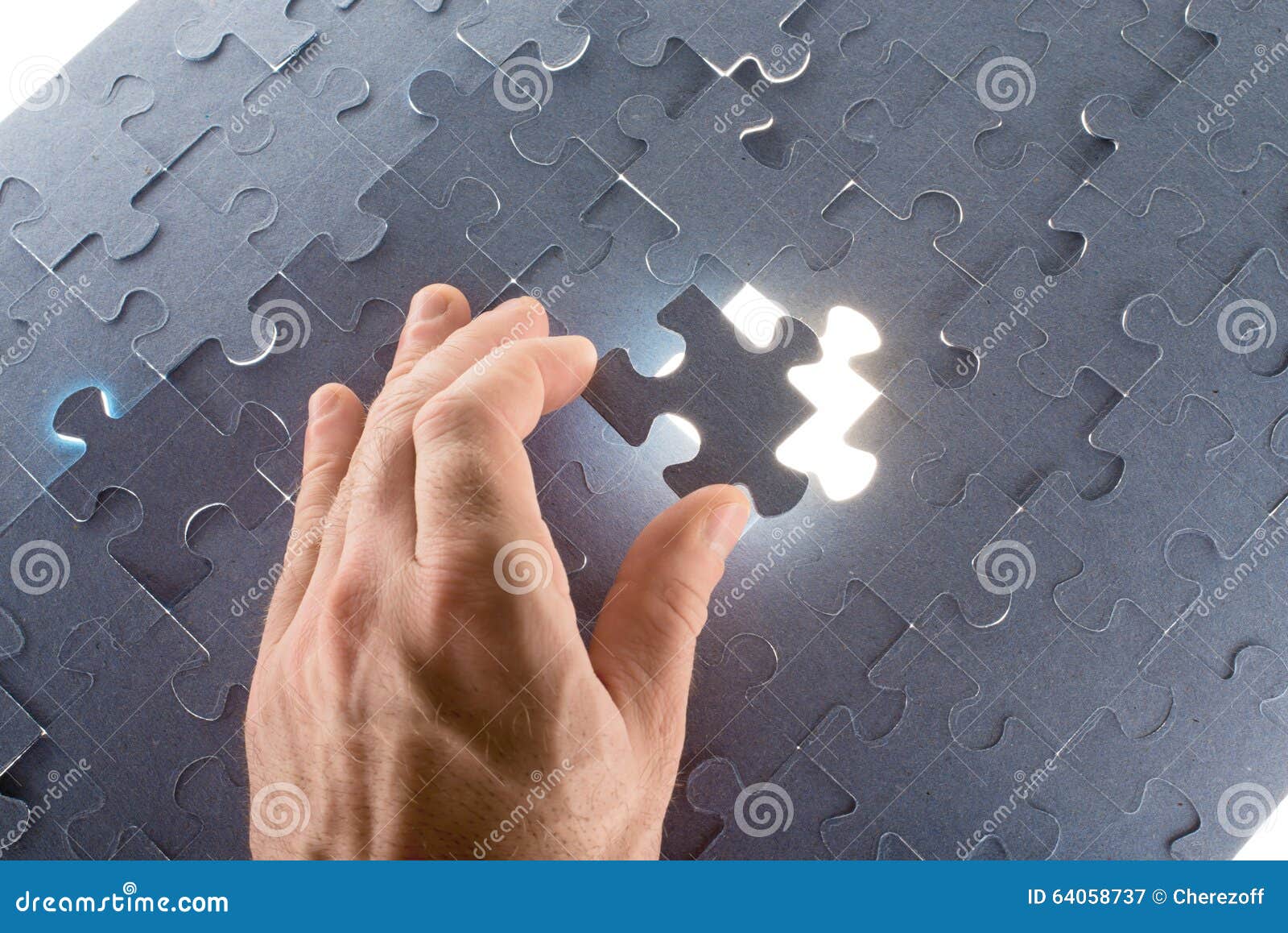 Man holding puzzle piece stock image. Image of connection - 64058737