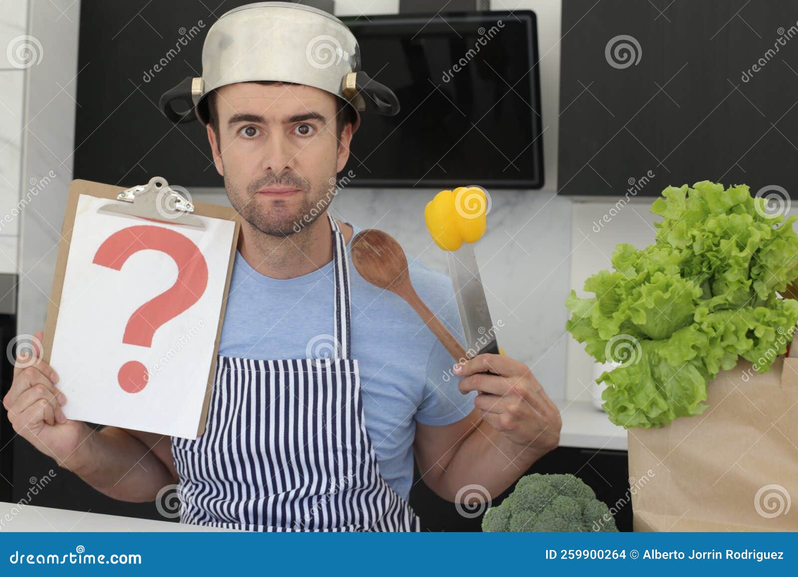 Man Holding Question Mark Sign in the Kitchen Stock Photo - Image of ...