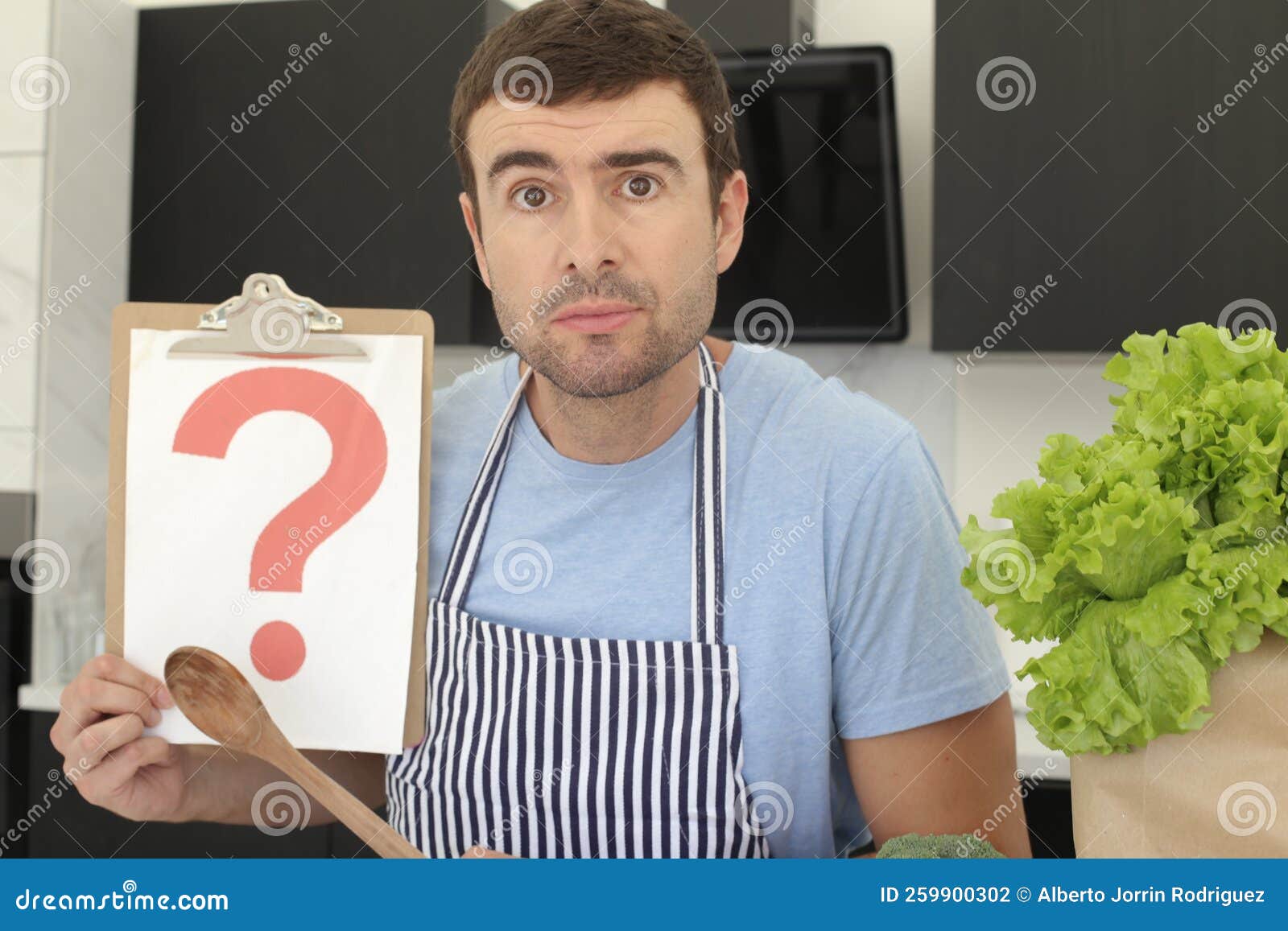 Man Holding Question Mark Sign in the Kitchen Stock Photo - Image of ...