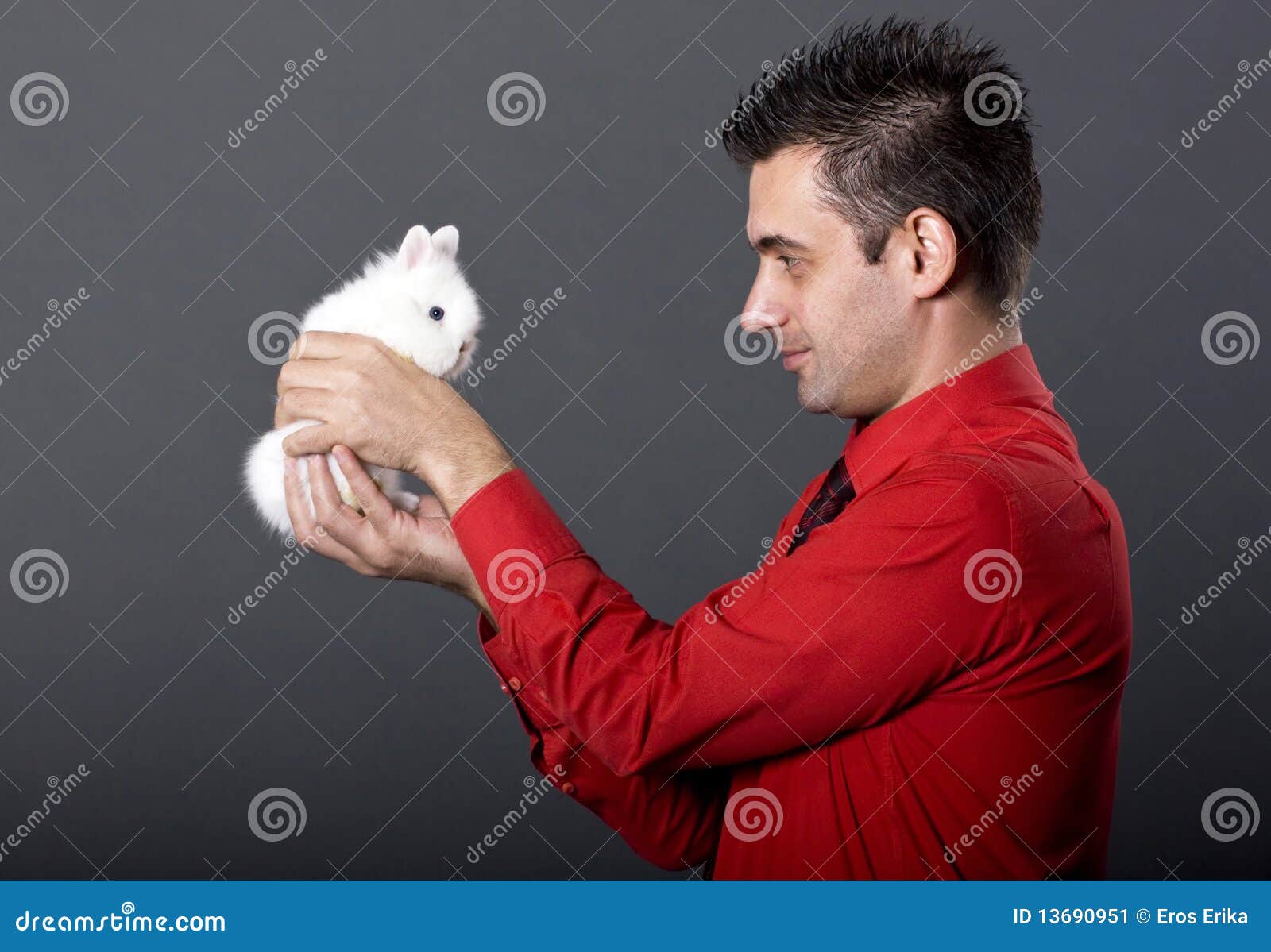 Man holding rabbit stock image. Image of mask, happy - 13690951
