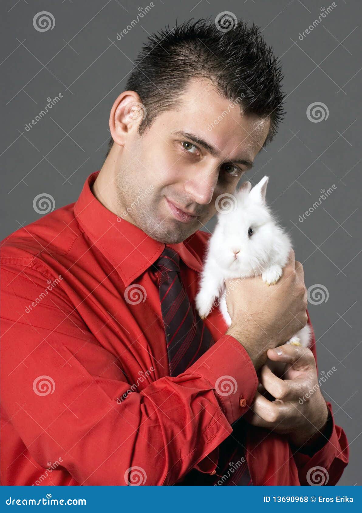 Man holding rabbit stock photo. Image of rabbit, business - 13690968