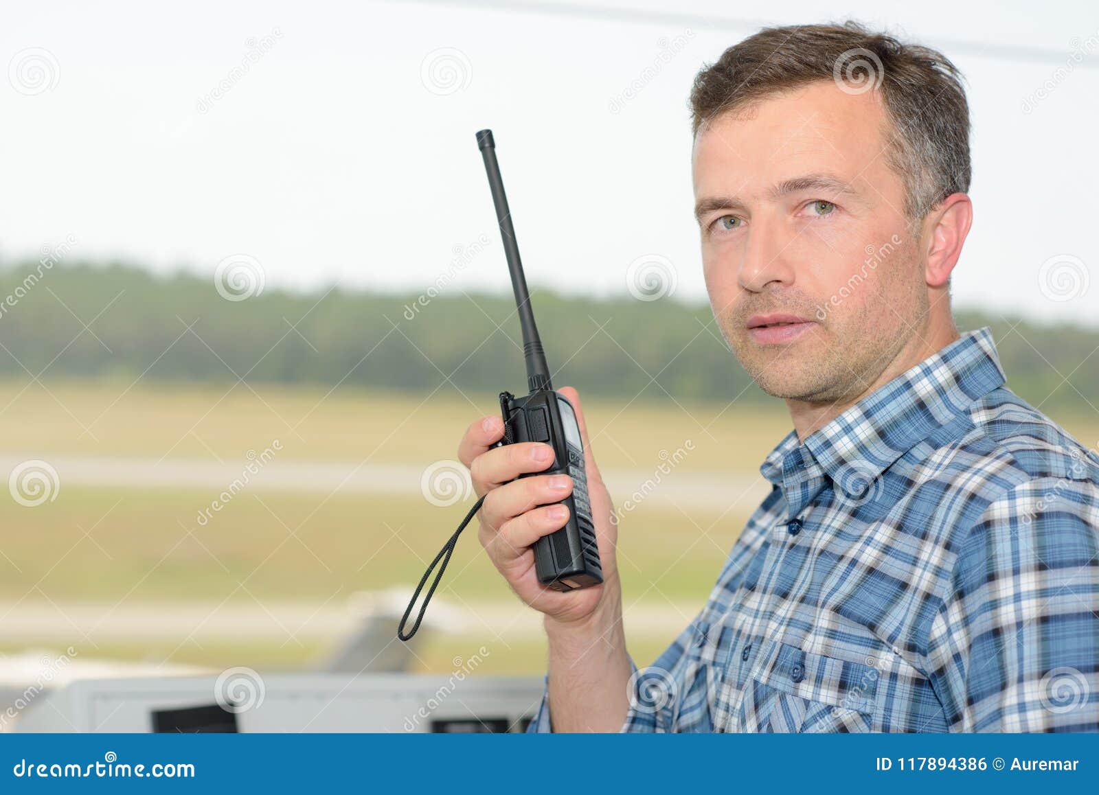 Man holding radio receiver stock photo. Image of responsability - 117894386