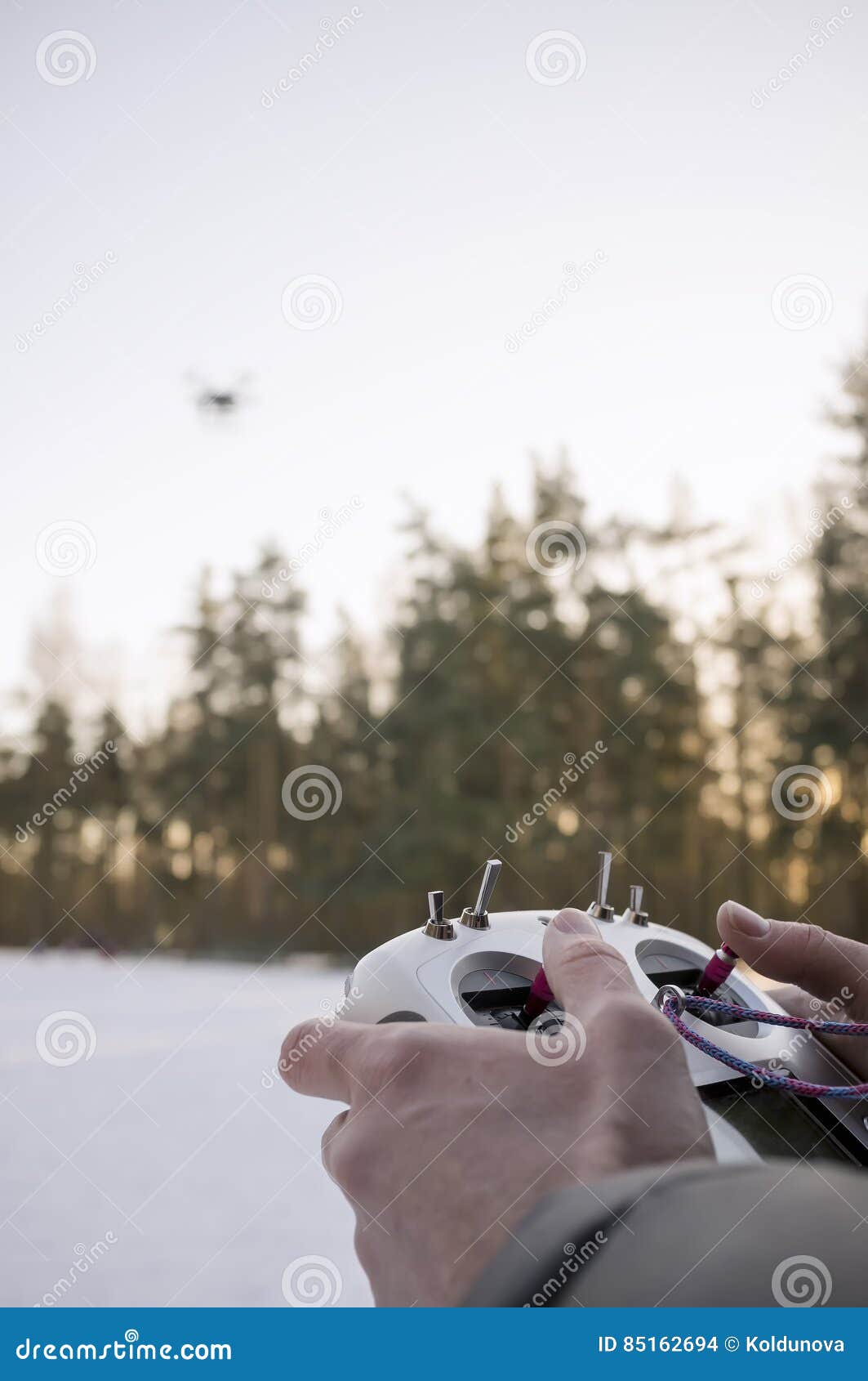 Man Holding a Remote Control of Drone Stock Photo - Image of control ...
