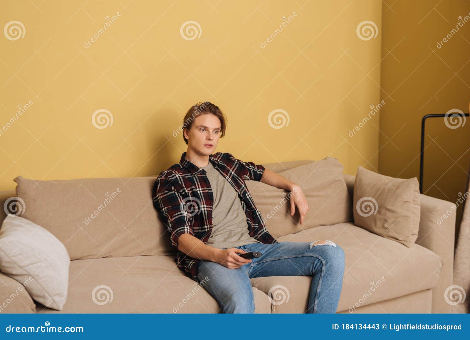 Handsome Man Holding Remote Controller and Stock Image - Image of ...
