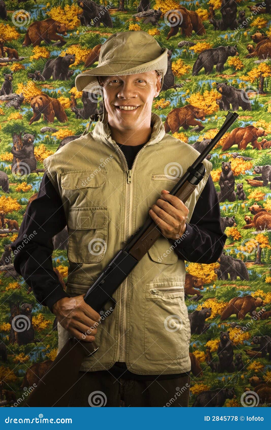 Man holding rifle. stock photo. Image of rifle, smiling - 2845778 Man holding rifle. stock photo. Image of rifle, smiling - 2845778