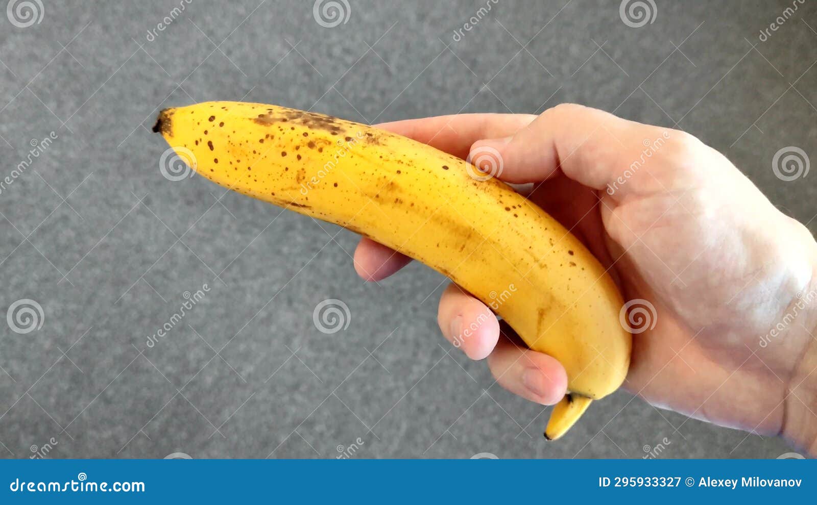 Man Holding a Ripe Banana in His Hand Stock Video - Video of indoors ...