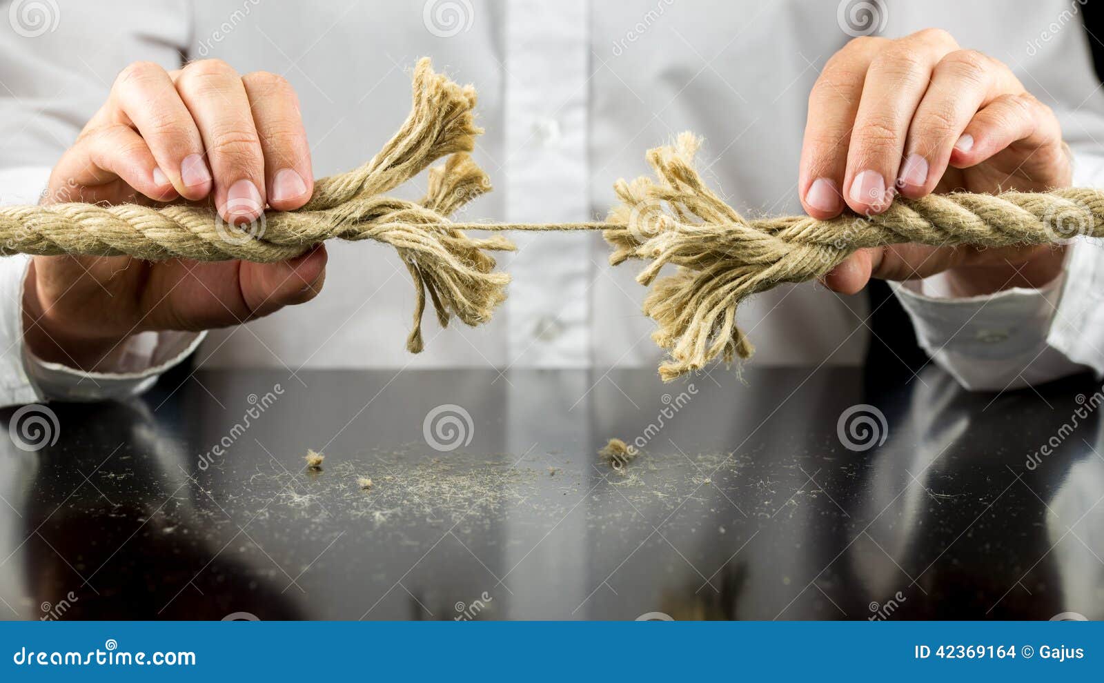Man Holding a Rope with One Remaining String Stock Photo - Image of ...
