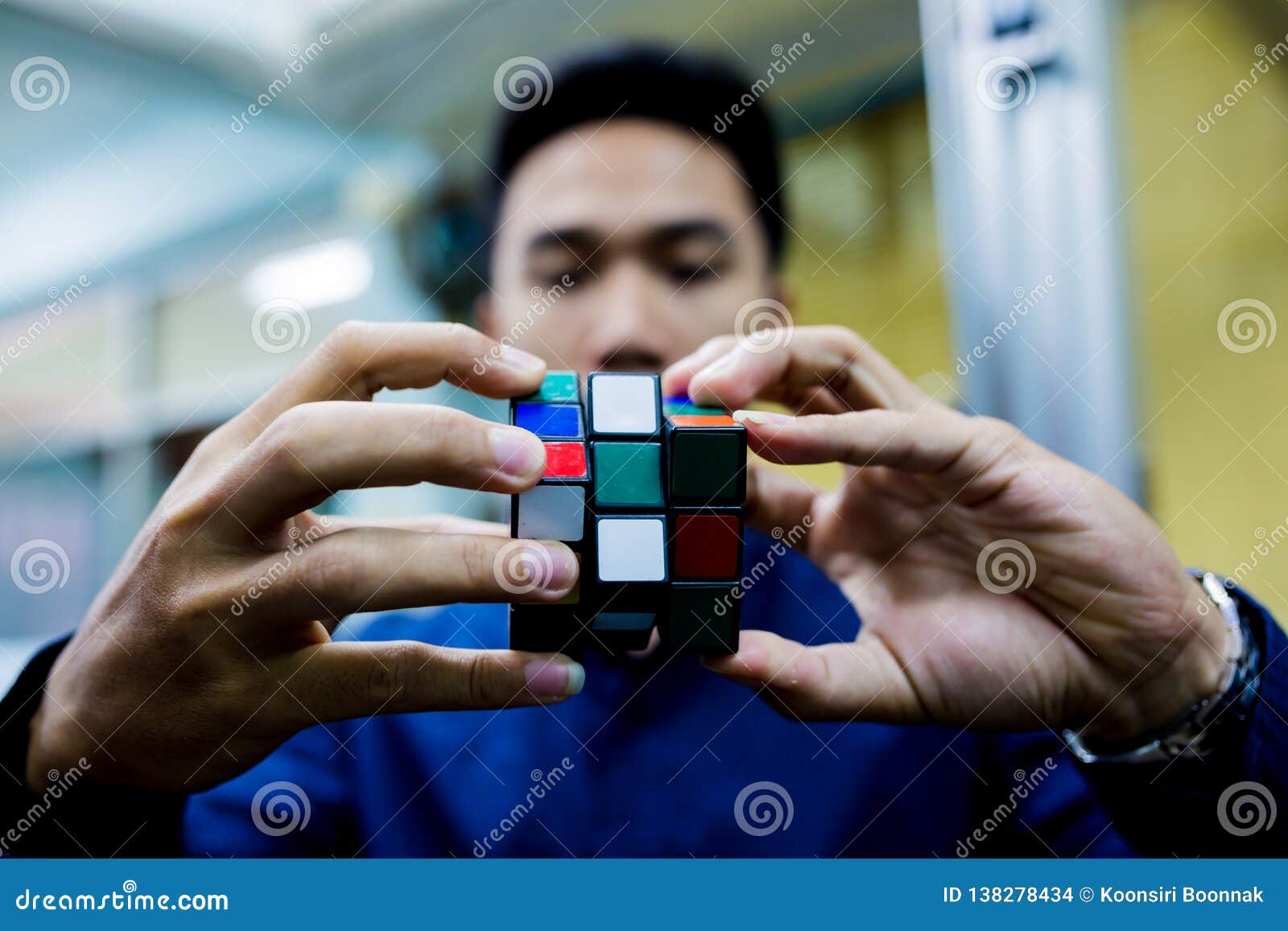 Man Holding Rubik`s Cube Techincal and Business Solving Problem ... Man Holding Rubik`s Cube Techincal and Business Solving Problem ...
