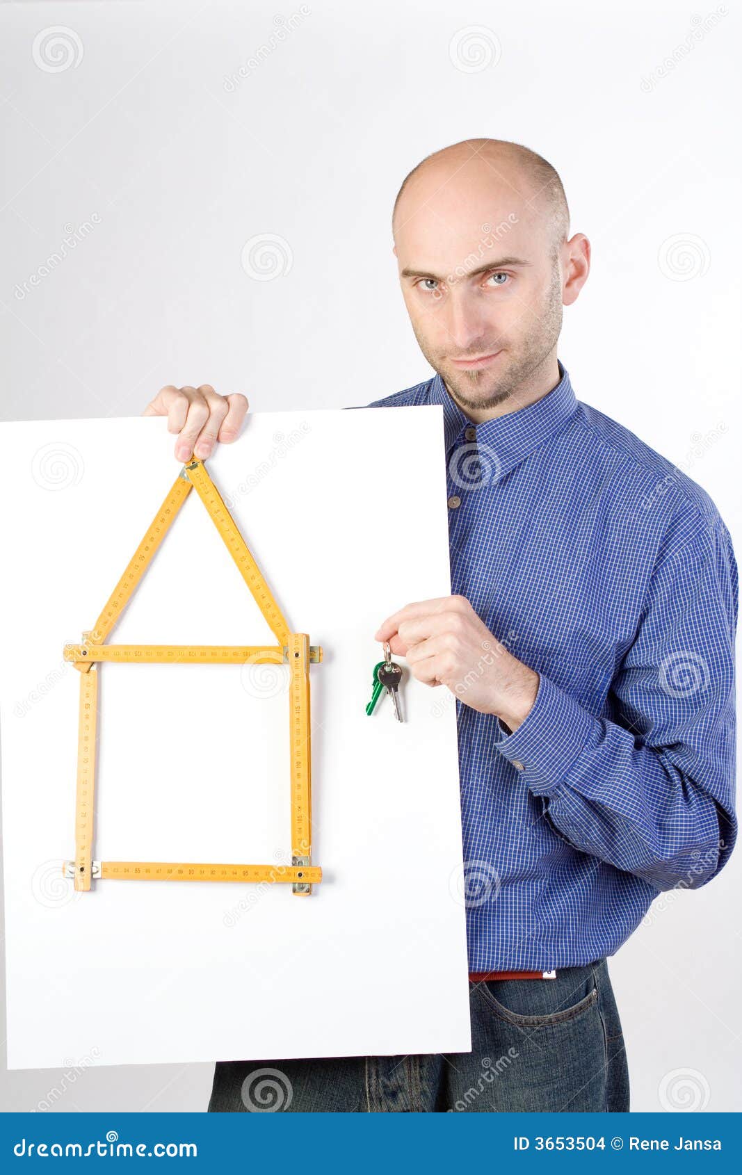 Man Holding Rulers and Keys Stock Photo - Image of building, caucasian ...