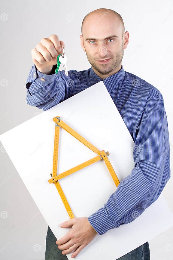 Man Holding Rulers and Keys Stock Image - Image of real, gripping: 3761799