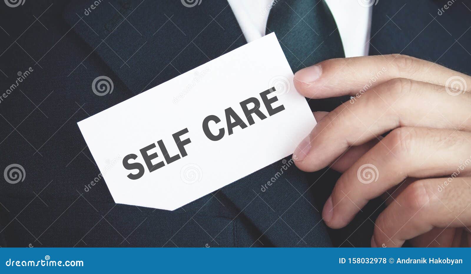 Man Holding Self Care Text on Business Card Stock Photo - Image of ...