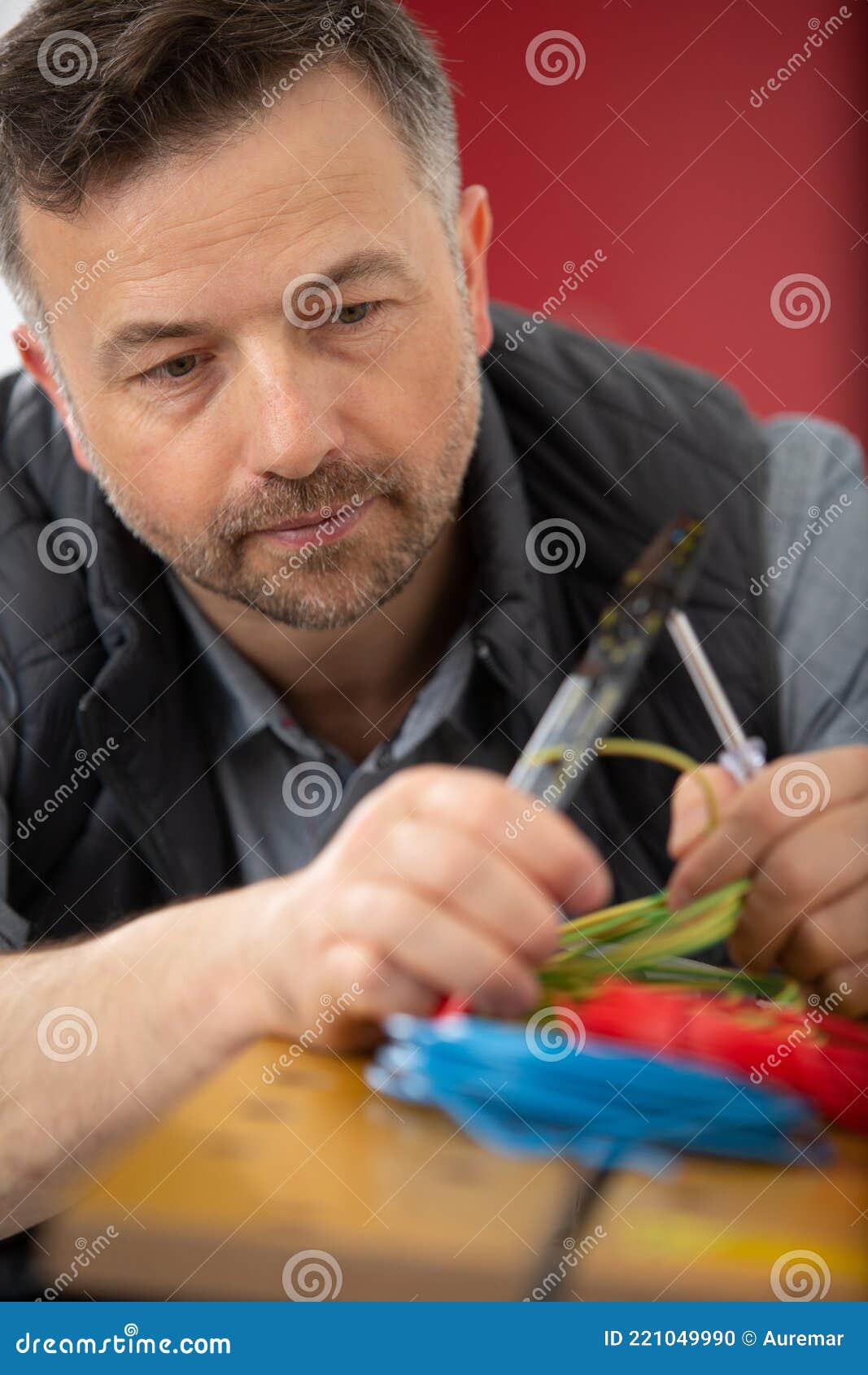 Man Holding Side Cutting Pillers and Conductors Stock Photo - Image of ...