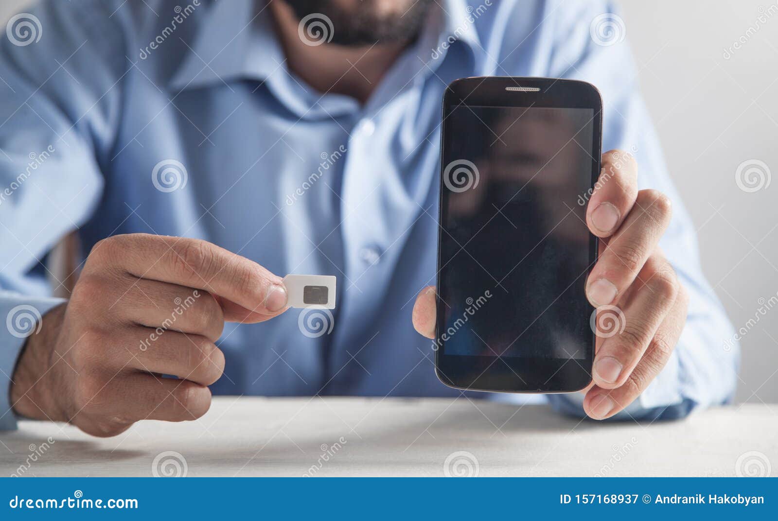 Man Holding Sim Card with Smartphone Stock Image - Image of finger ...