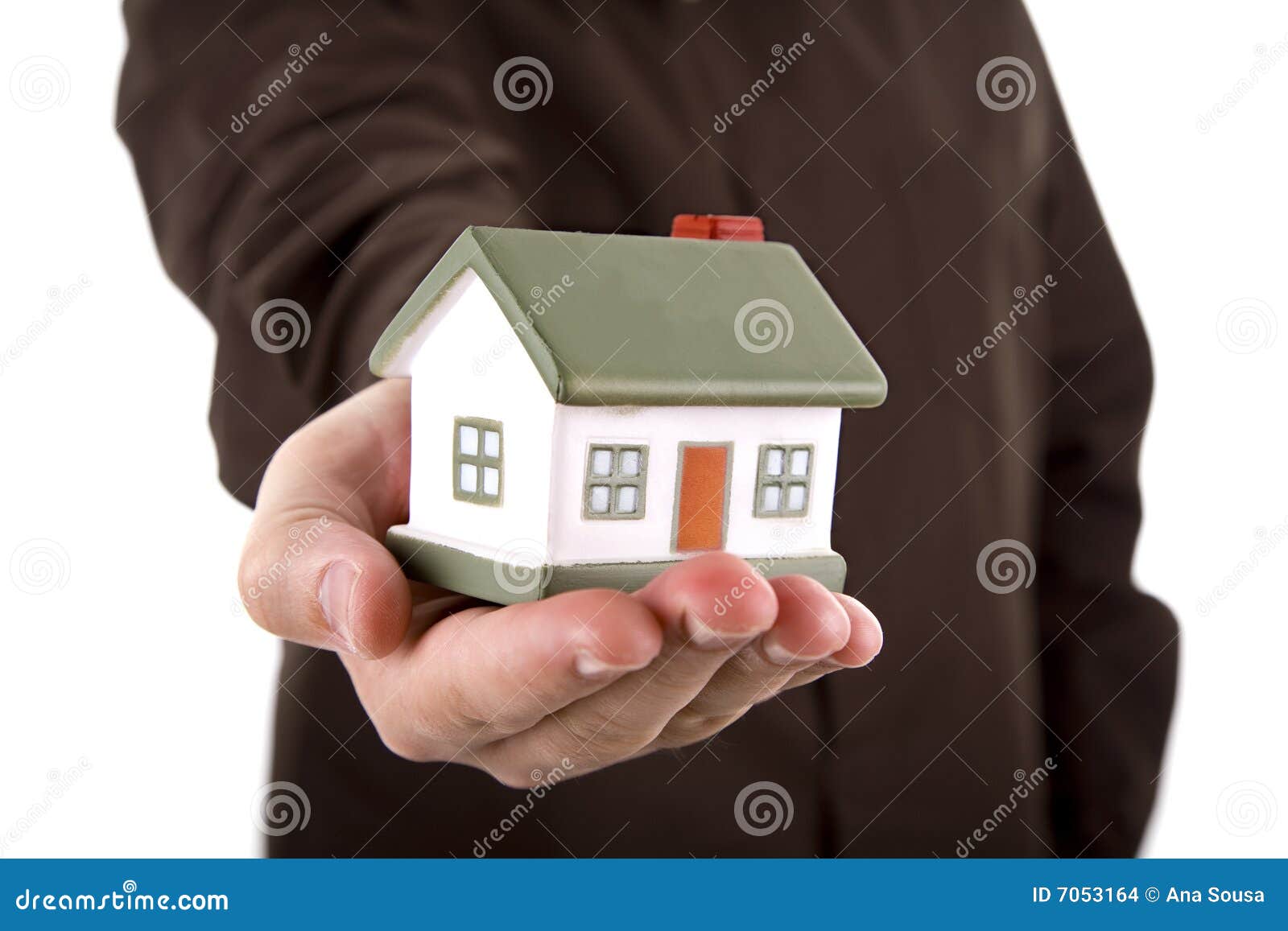 Man holding a small house stock photo. Image of construction - 7053164