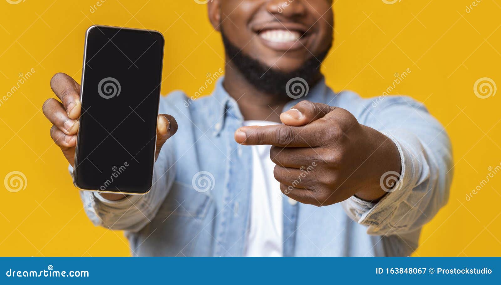 Man Holding Smartphone with Black Screen and Pointing on it Stock Image ...