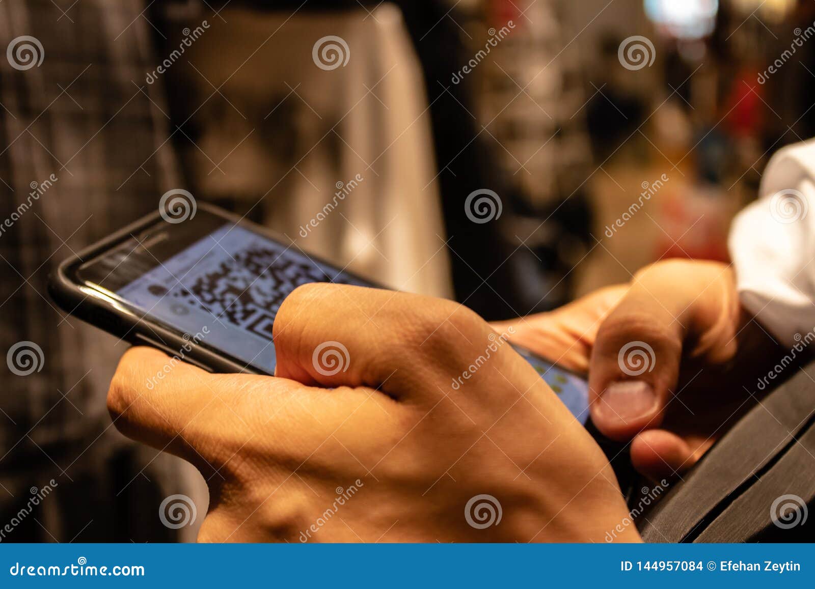 A Man Holding Smartphone and Checking Something Stock Photo - Image of ...