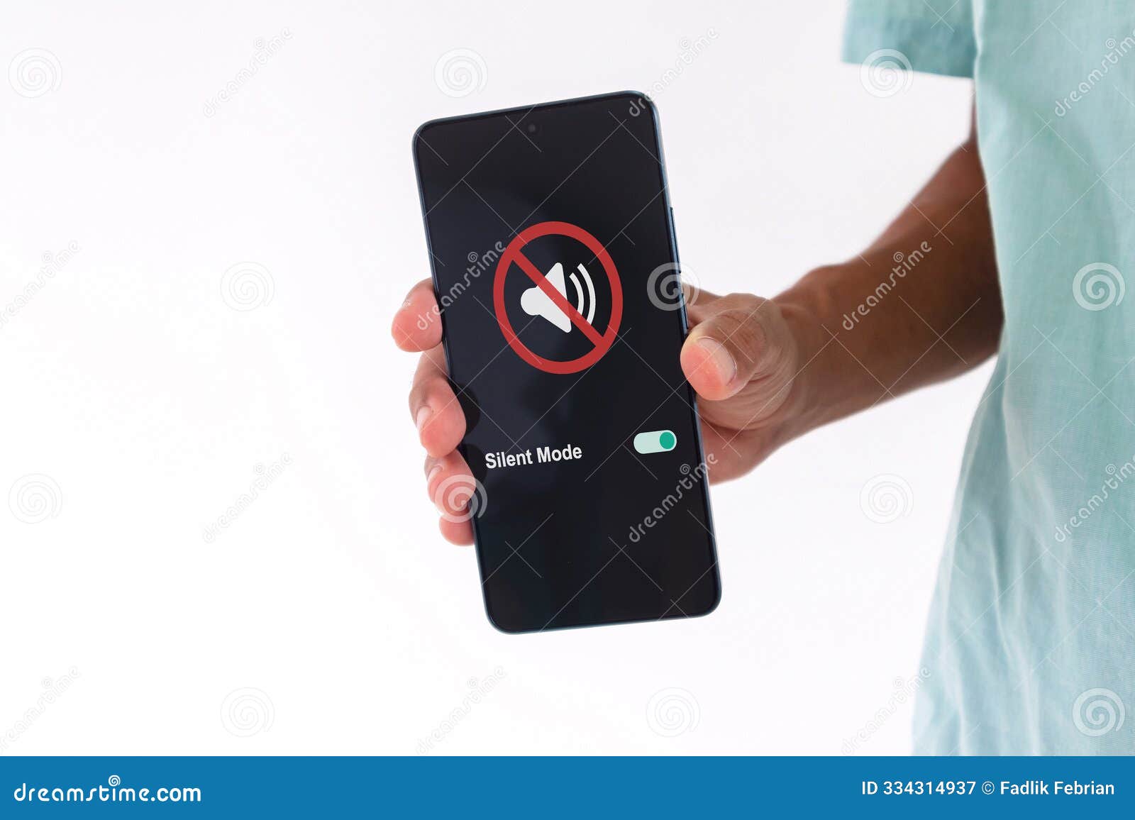 Man Holding a Smartphone with Mute Sound or Silent Mode Symbol on the ...