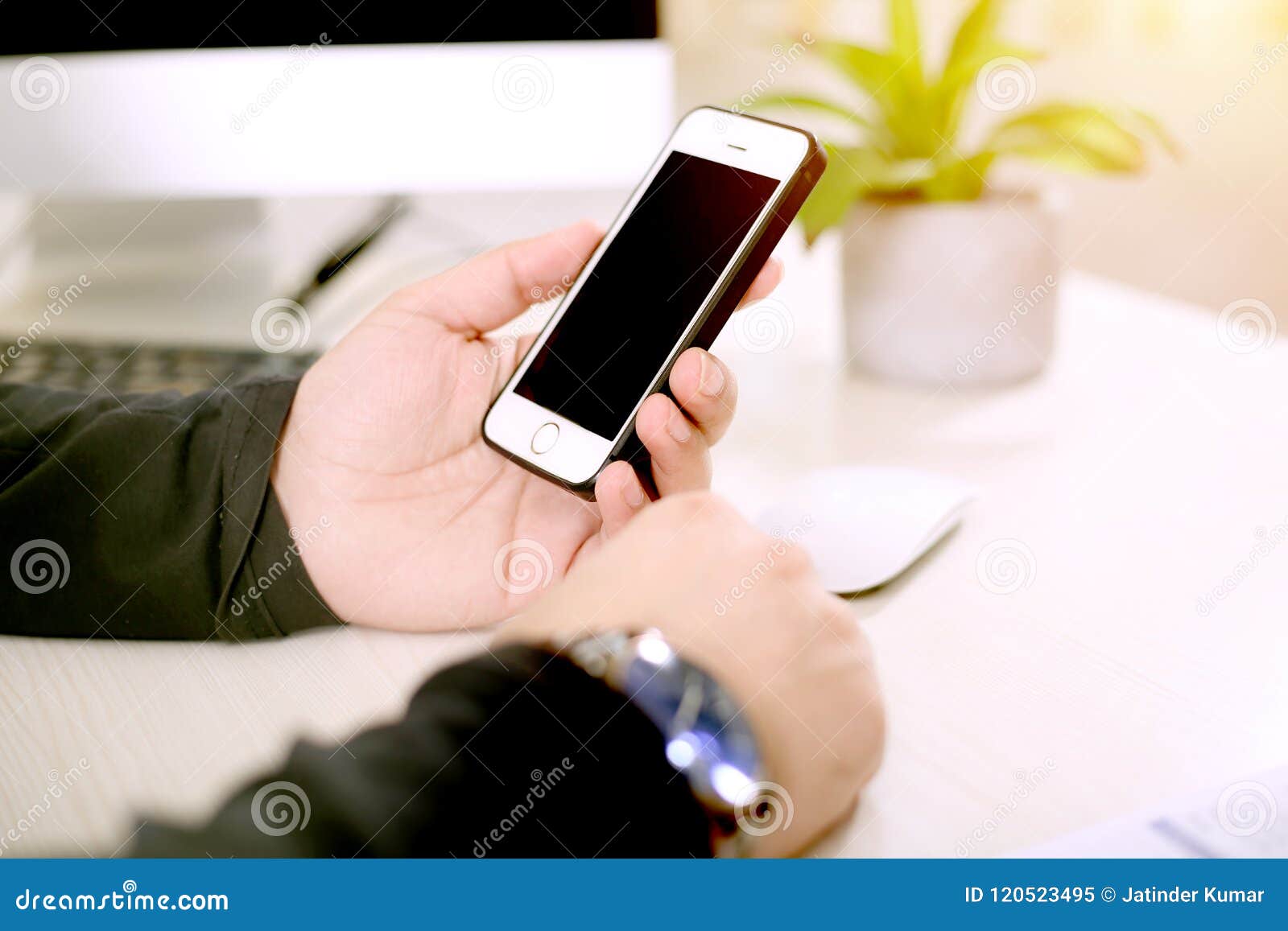 Man holding phone in hand. stock image. Image of computer - 120523495