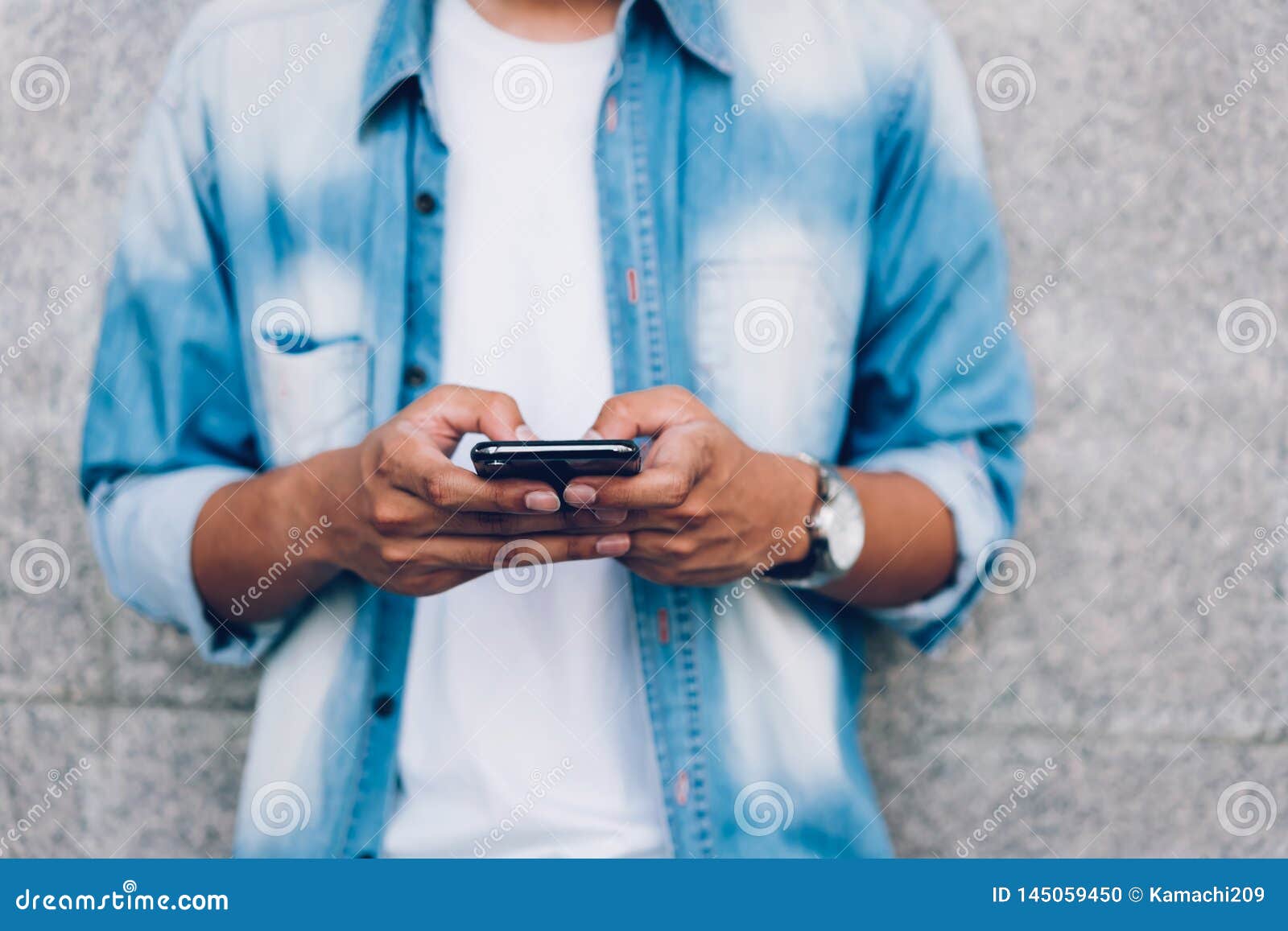 Man Holding a Smartphone. Using Cell Phone on Lifestyle. Technology for ...
