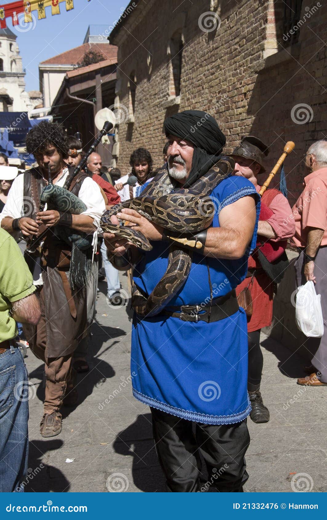 Man holding a snake editorial photo. Image of antique - 21332476