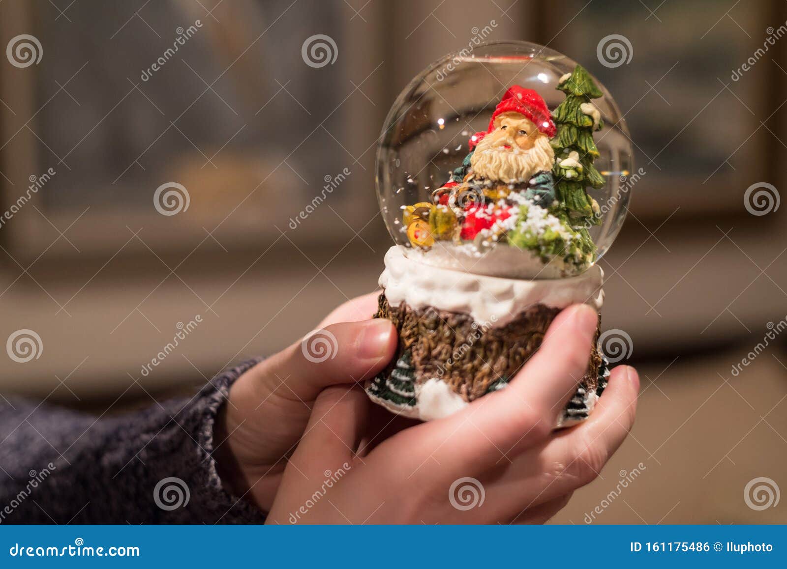 Man Holding a Snow Globe on Hands Stock Photo - Image of white, ball ...