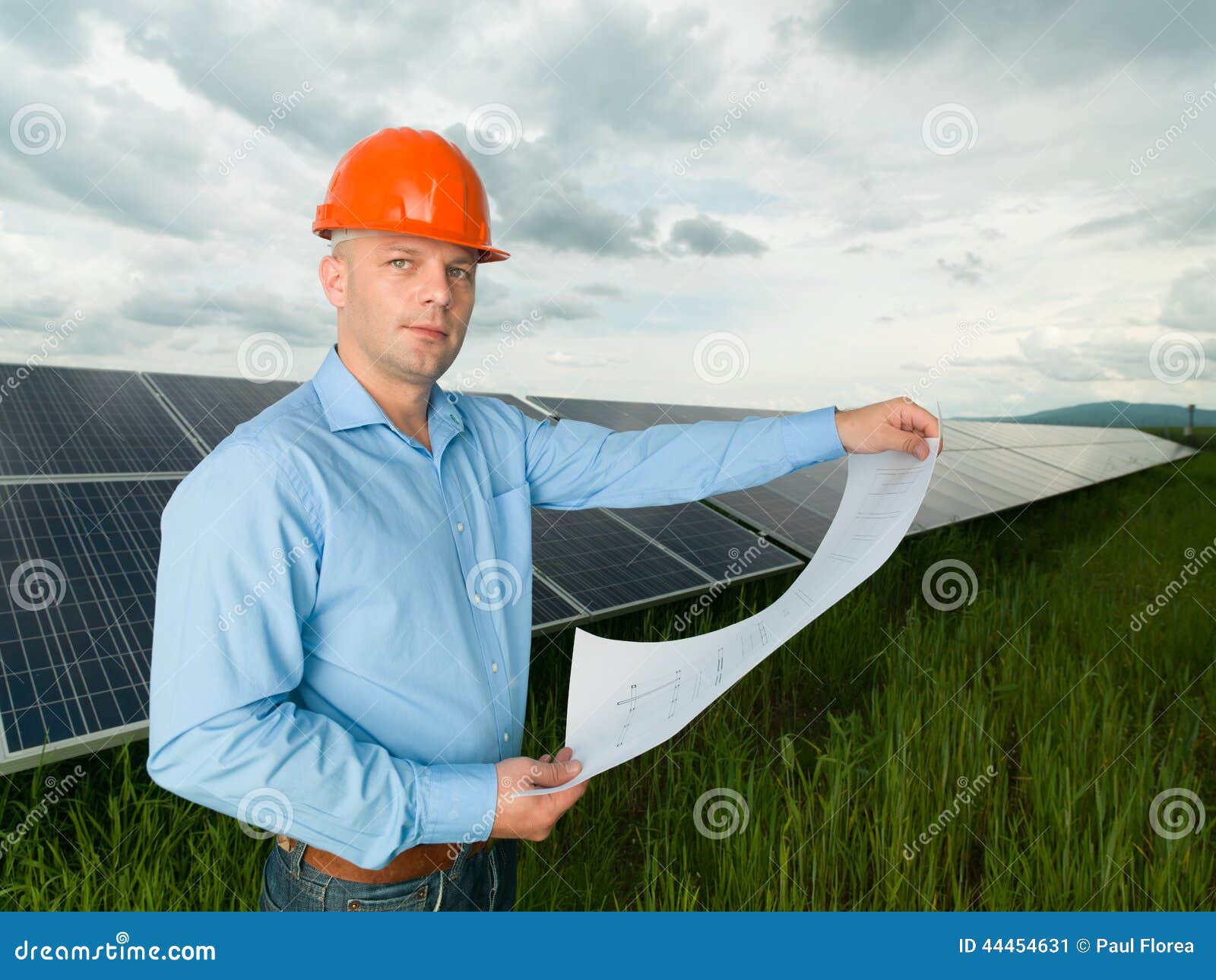 Man Holding Solar Panel Station Plans Stock Image - Image of ...