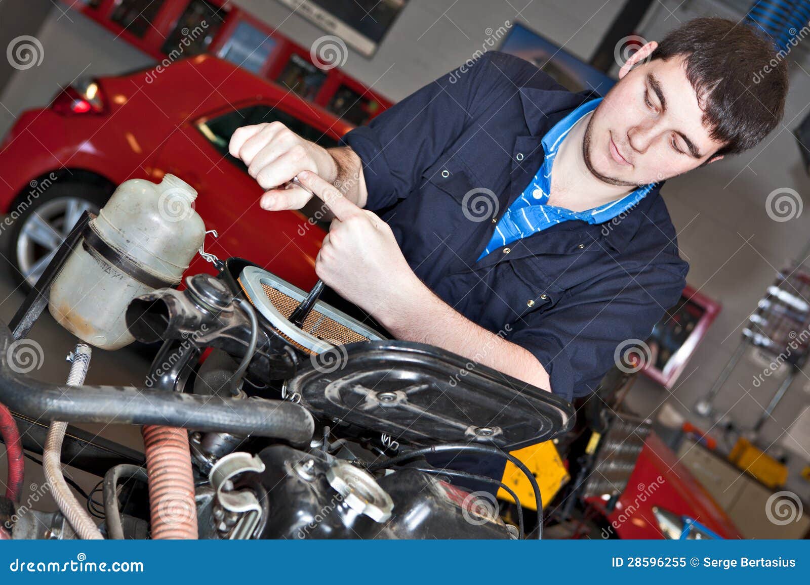 Man Holding a Spanner Over a Car Engine Stock Image - Image of motor ...