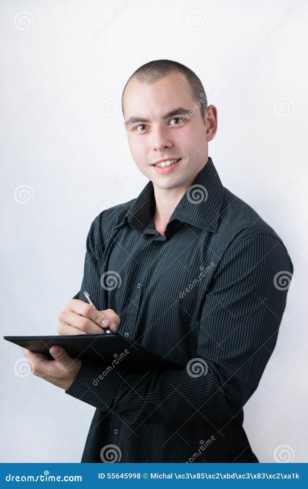 Man Holding Stack of Papers and Writing Stock Photo - Image of ...