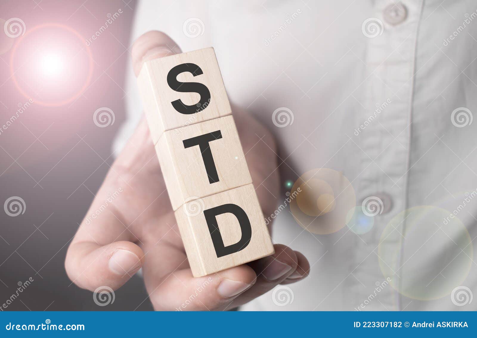 Man Holding Std Word on Wooden Cube Stock Photo - Image of team ...