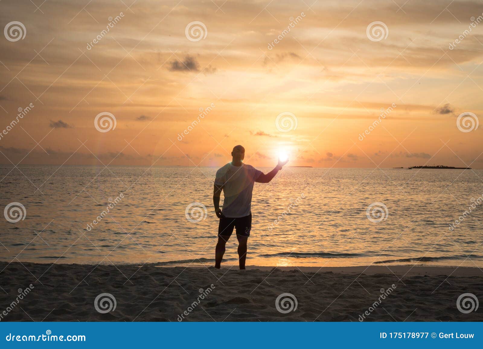 Man Holding Sun in Hand at Sunset Stock Image - Image of frying ...