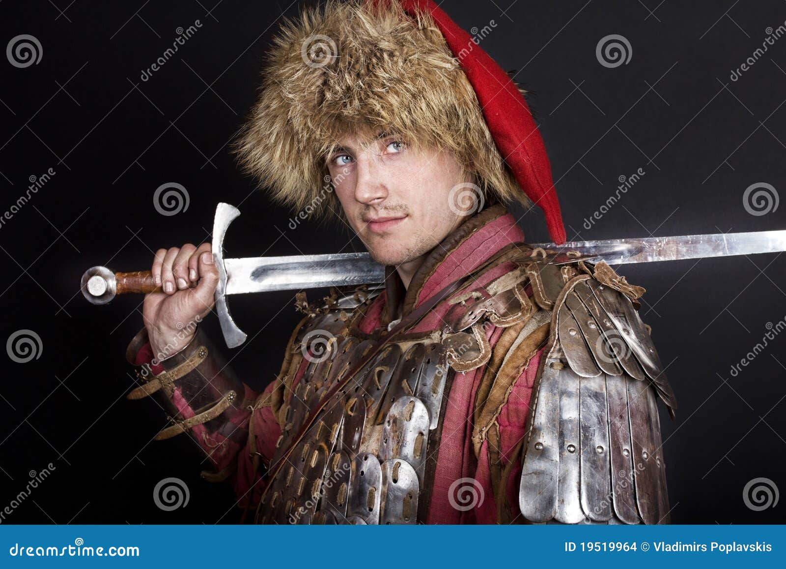 Man Holding a Sword and Posing Stock Photo - Image of battle, fighter ...